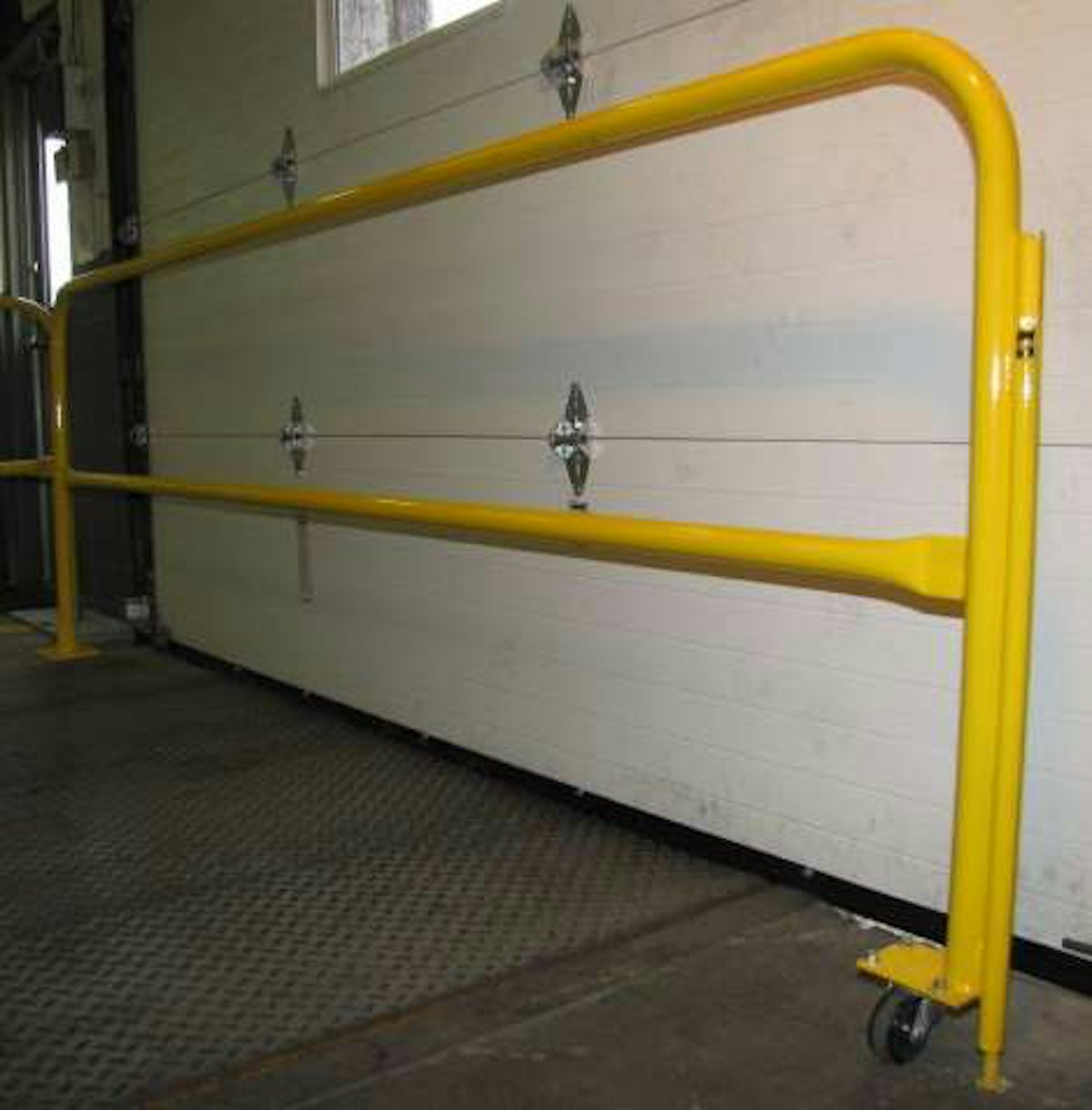 Loading dock safety gate can be rolled back | Commercial Carrier Journal