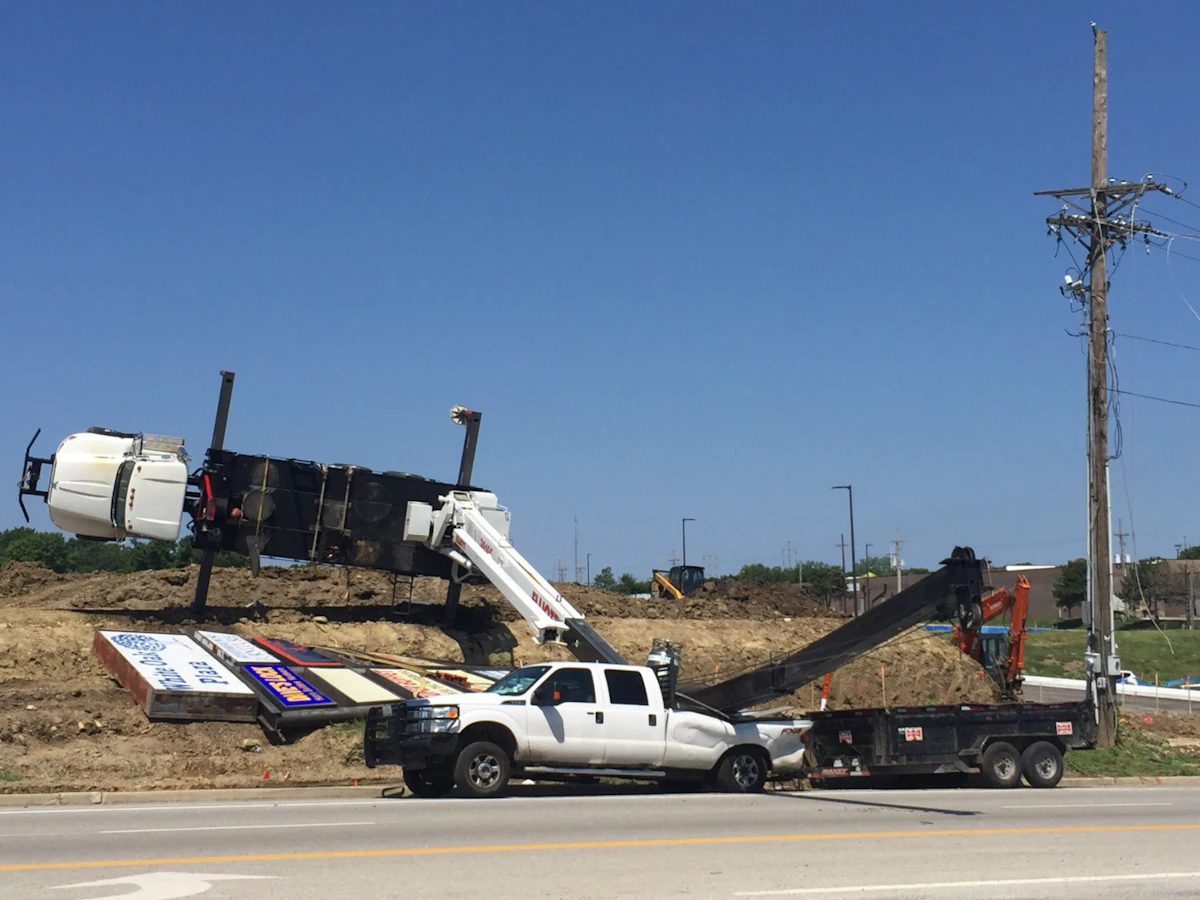 Crane truck tips over, crushes nearby pickup | Commercial Carrier Journal