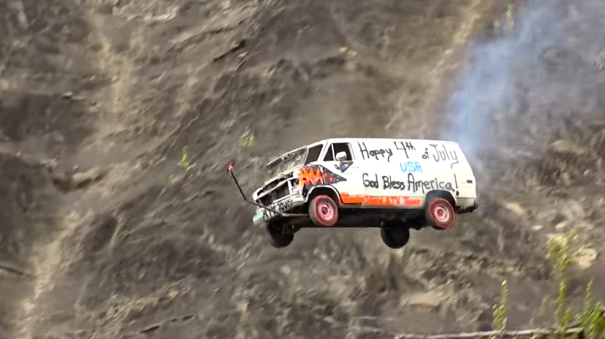 Cliff for clunkers: Alaskans run junk vehicles off a cliff for Fourth ...